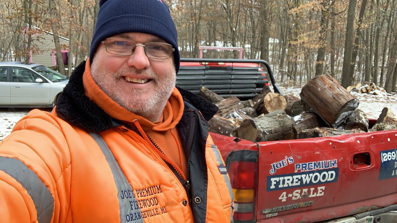 FIREWOOD - splitting hickory firewood out of & back into truck - YouTube