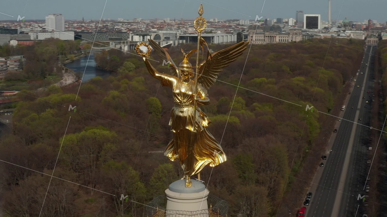 AERIAL: Close Up Circling around Berlin Victory Column Golden Statue ...