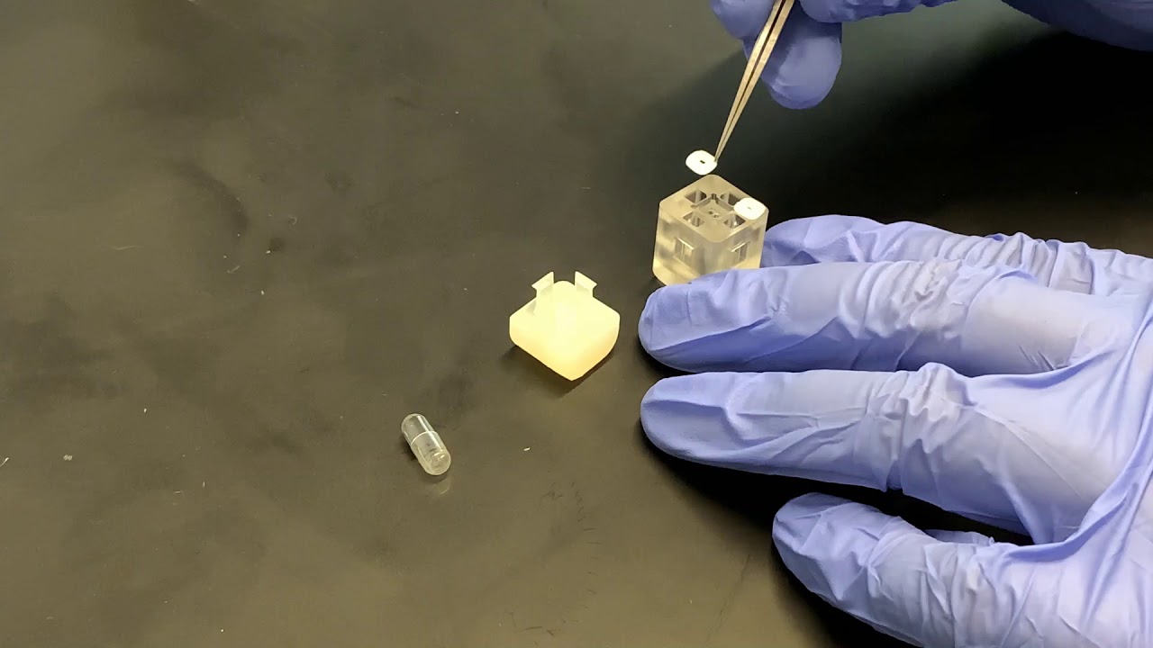 Installing solid-state nanopore support chip in a flow cell - YouTube