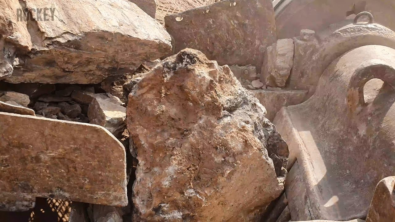 powerful Huge rock Breaker working Impact crusher rock quarry crushing ...