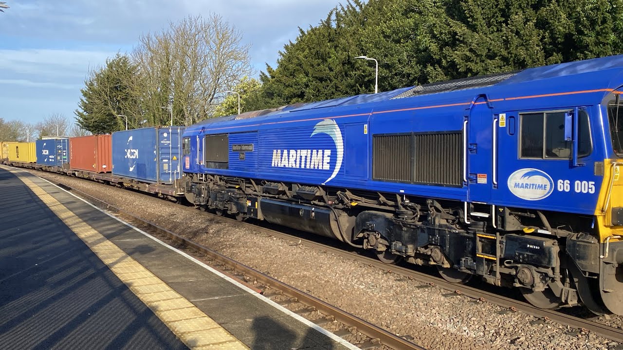 “Maritime Intermodal One” a blue red train! 66005 with 32 containers 11 ...