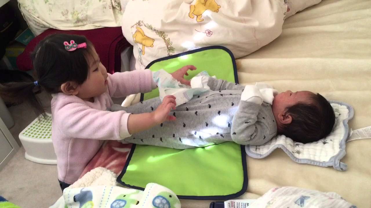 Kara Is a good helper on changing baby Aaron's diaper - 1.13.2016 - YouTube