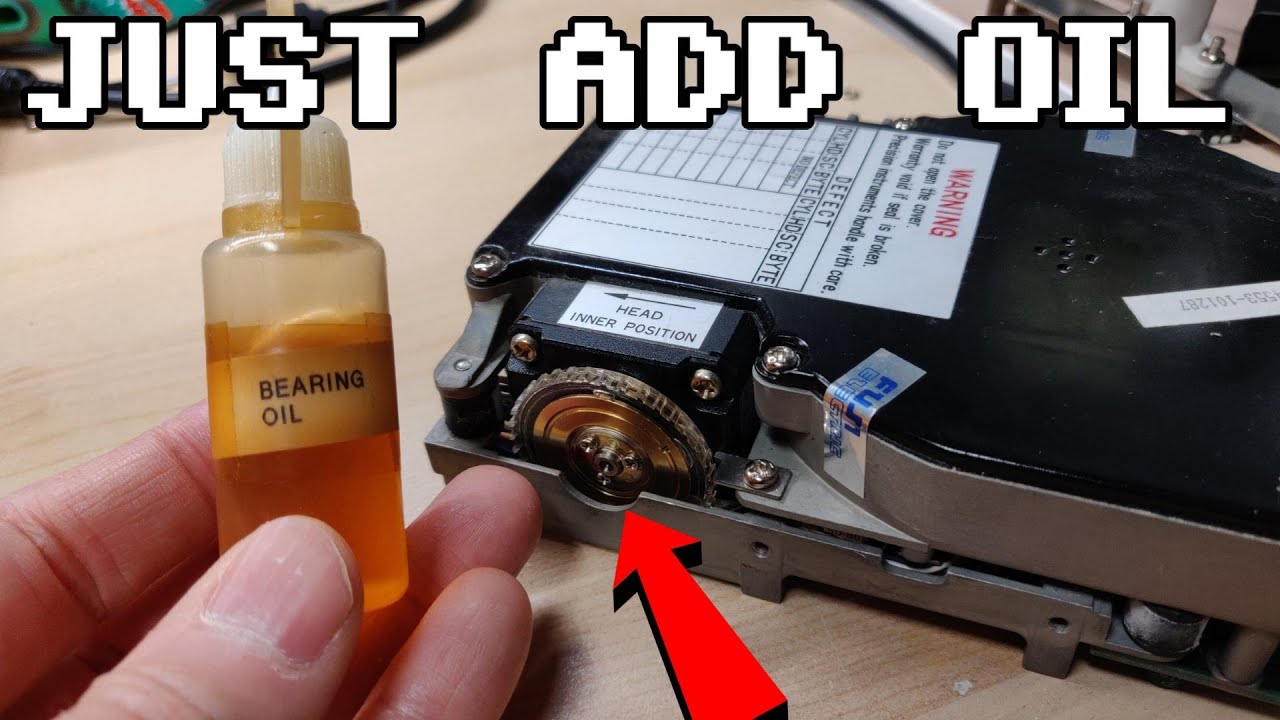 Reviving an old hard drive with some oil - YouTube