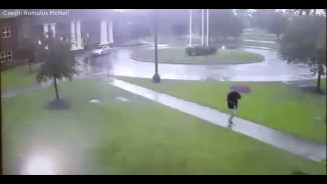 Video shows man get struck by lightning while walking in storm - YouTube