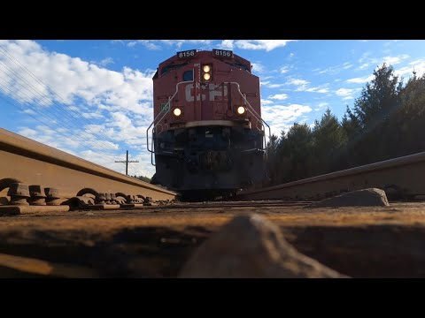 Northbound CP intermodal train runs over my camera! - YouTube