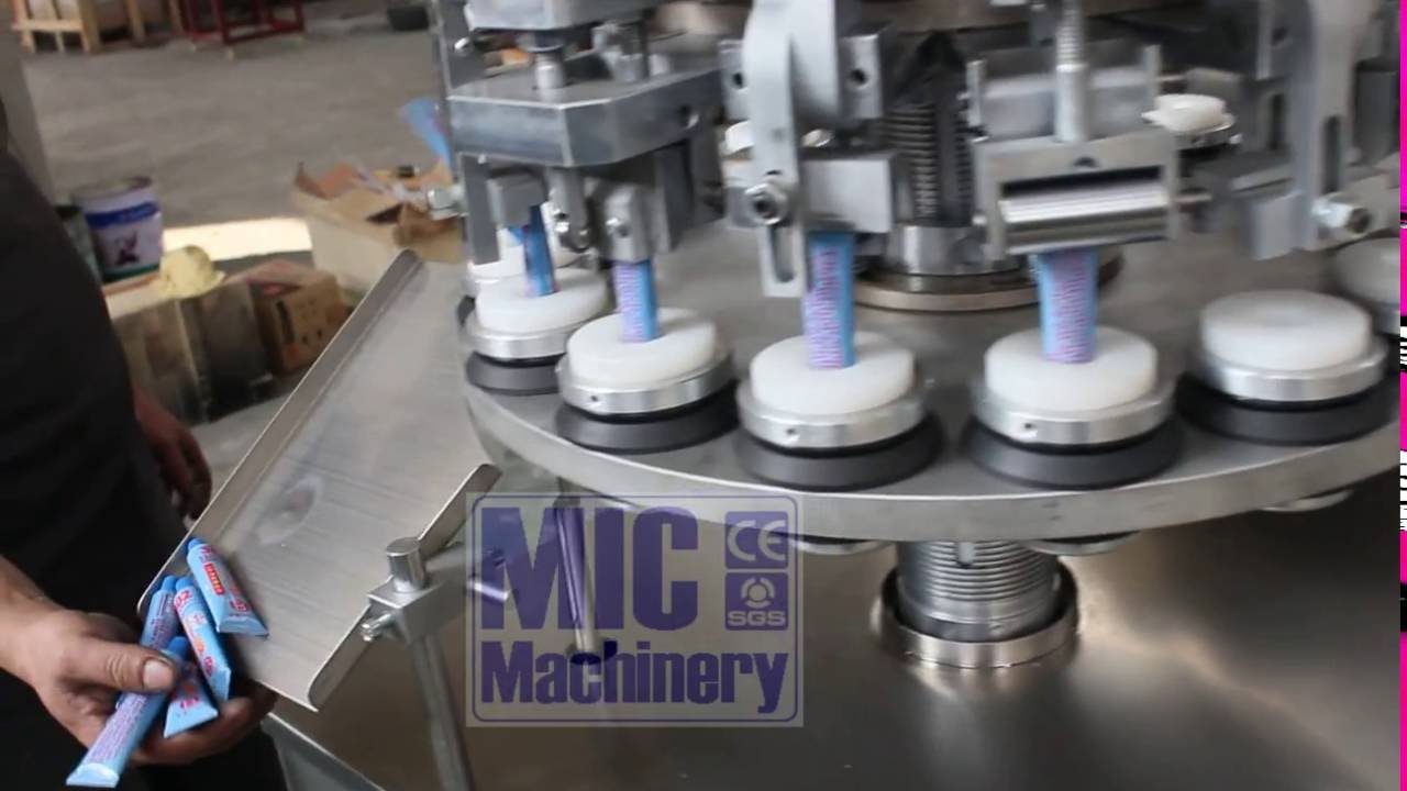 MIC Manual tube feeding aluminum tube filling sealing machine - YouTube