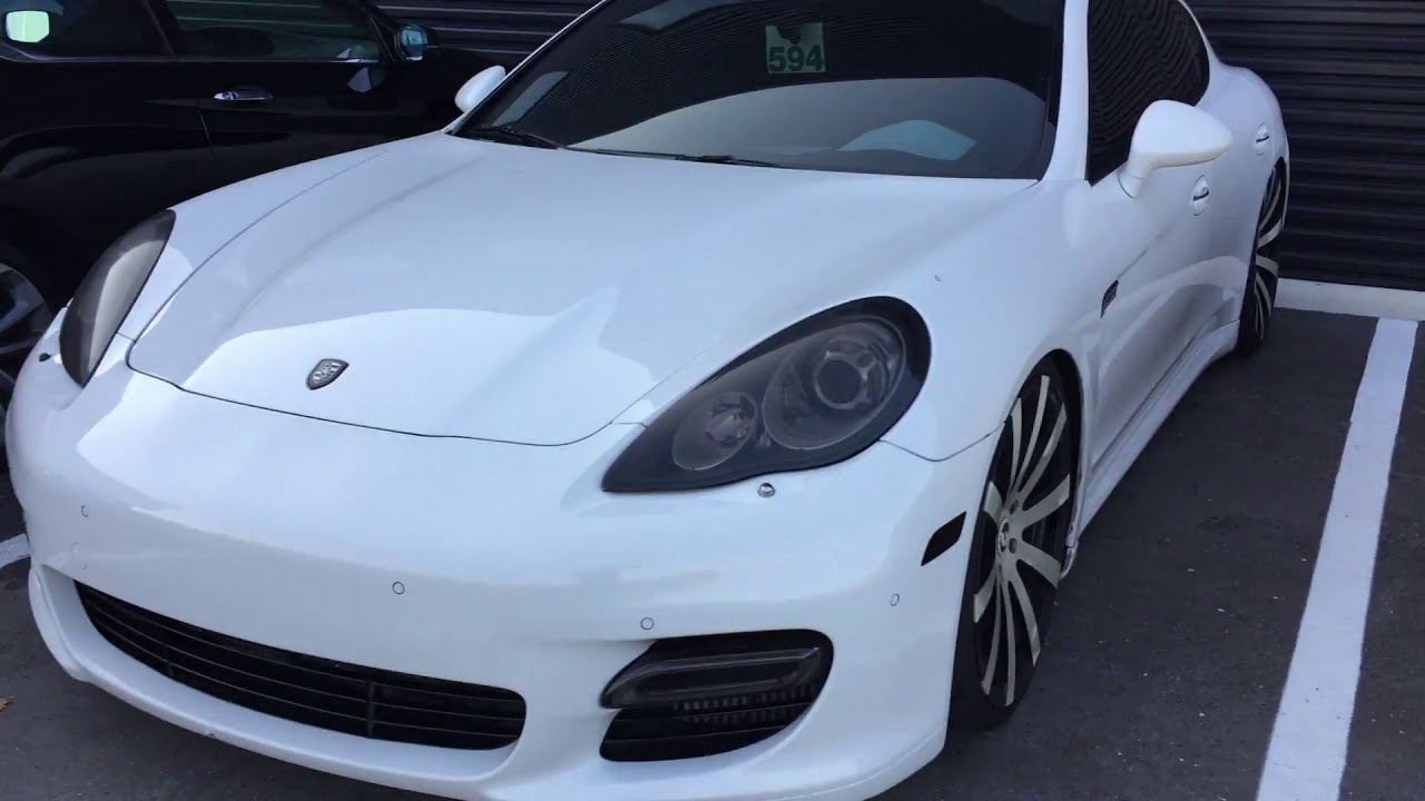 White Porsche Panamera Turbo with huge rims and tires Lowered - YouTube