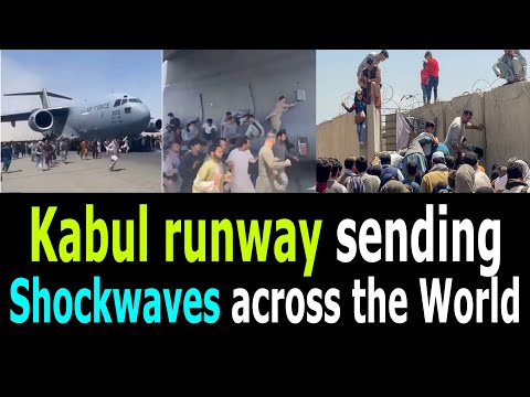 Afghans run along, cling to US Air Force jet