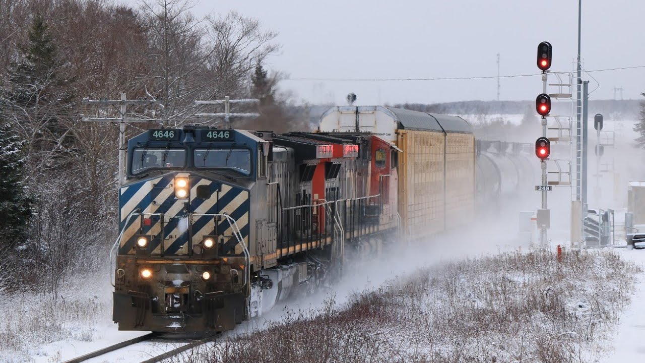 BC Rail 4646 Kicking Up Snow Through Folly Lake - YouTube