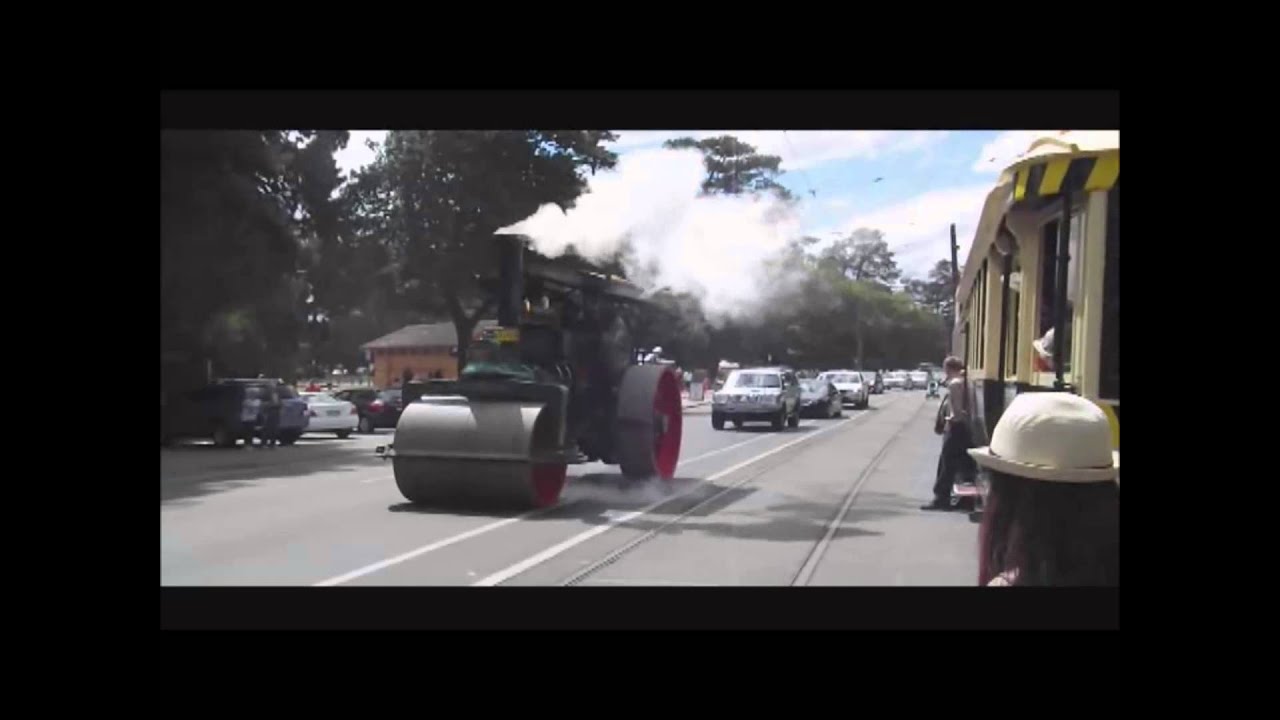 Steam powered vehicles passing one of Ballarat's early electric trams ...
