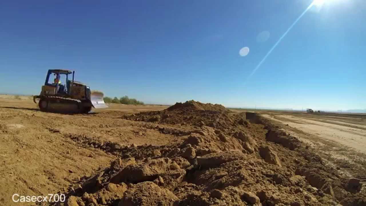 D5K2 Dozer Backfilling a Trench - YouTube