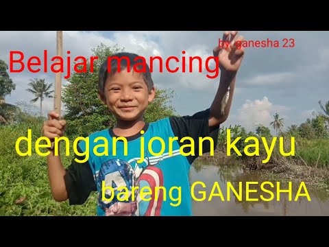 Belajar mancing dengan joran kayu...