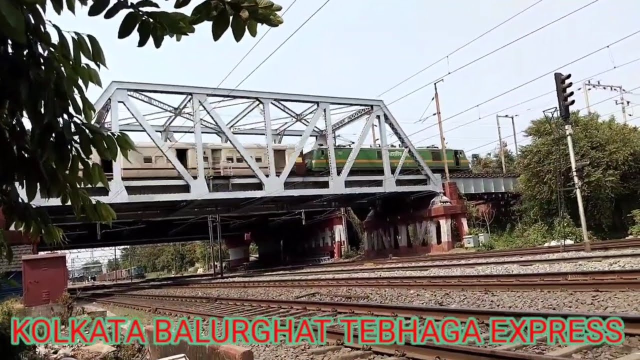DOWN BALURGHAT KOLKATA EXPRESS CROSSING RAIL BRIDGE - YouTube