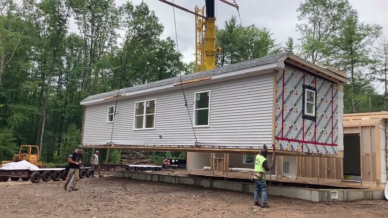 July 25 2022 second view of modular house being set from ground level ...