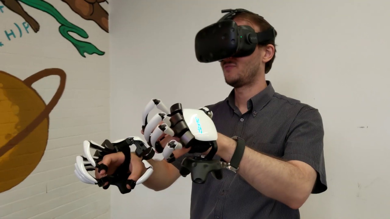 Hands-on with Dexta Robotics's Dexmo Gloves Force Feedback System - YouTube