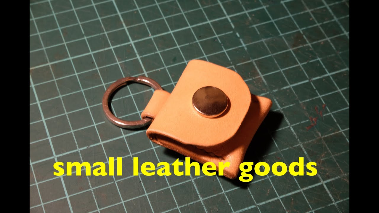 making a little leather keychain pouch leather crafting - YouTube