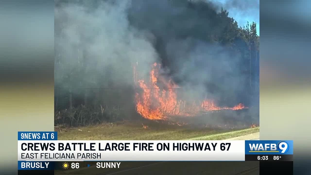 Crews battle large fire on Highway 67 in East Feliciana Parish - YouTube