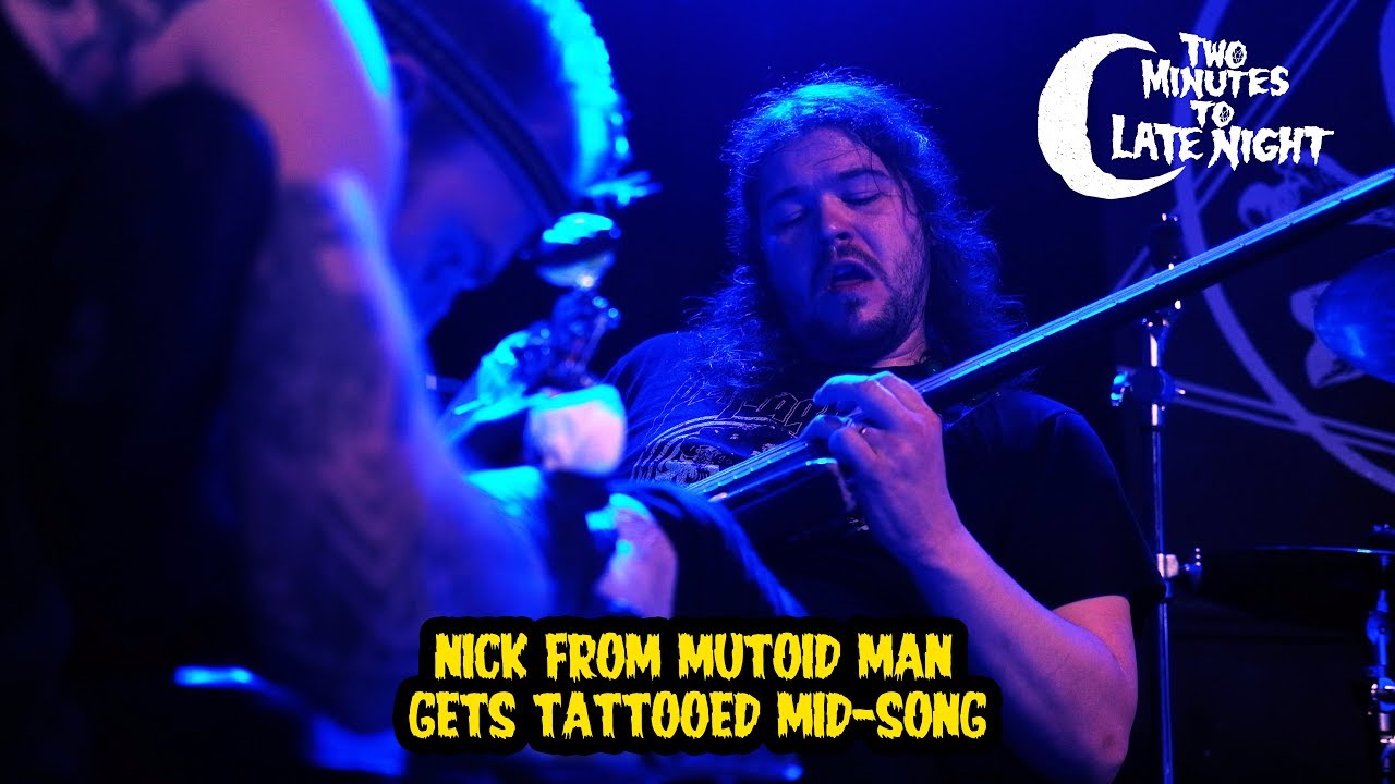 Nick From Mutoid Man Gets Tattooed Mid-Song - YouTube