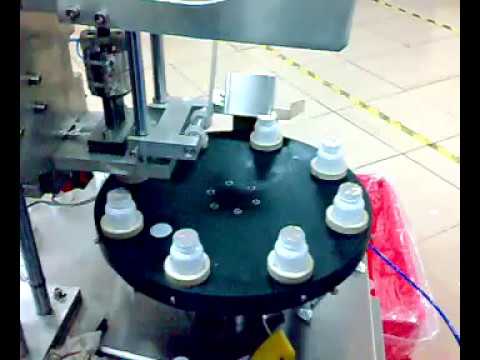Aluminium foil conduction sealing machine - YouTube