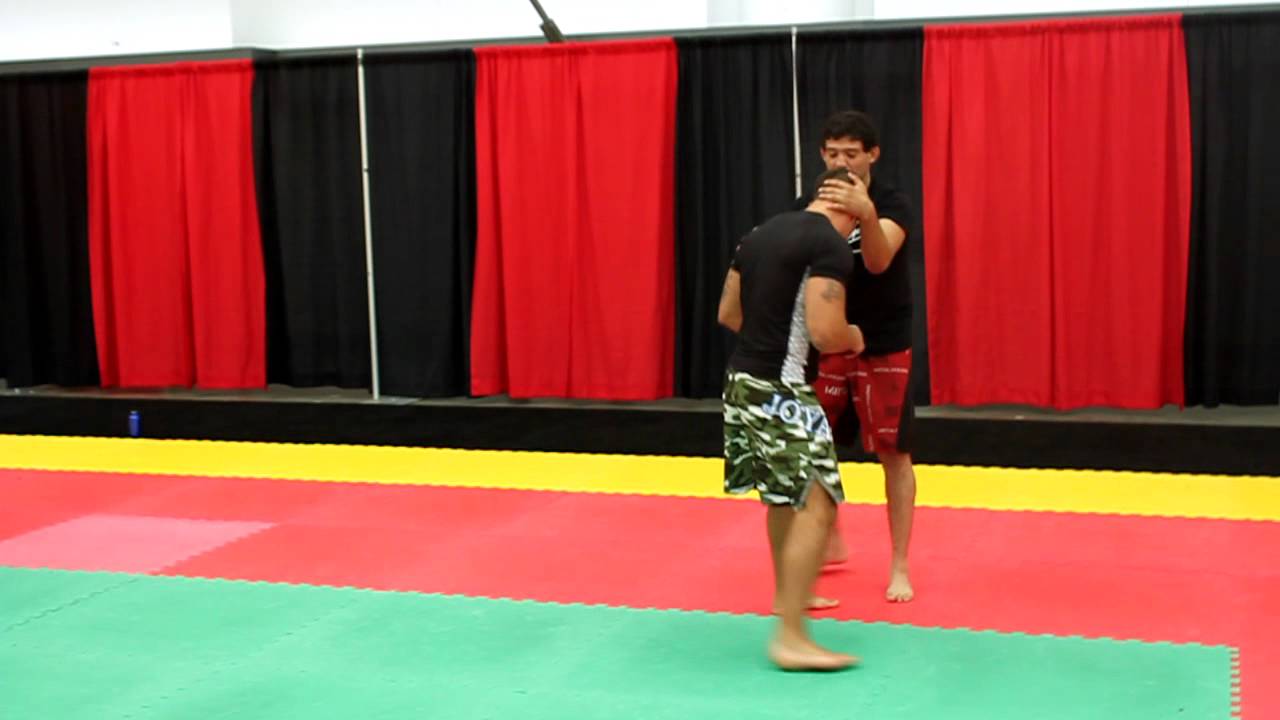 How to throw a knee from the clinch with Gilbert Melendez - YouTube