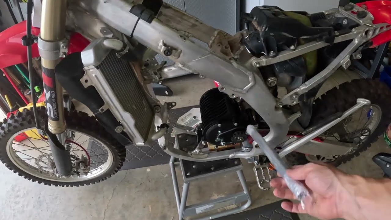 How I mounted an electric motor into a CRF frame. - YouTube