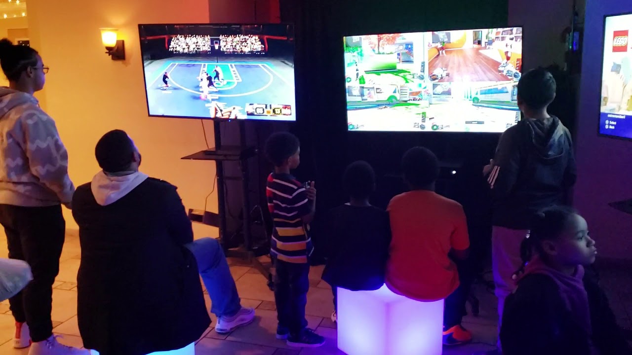 Indoor/Event hall 4 game station event w/ LED stools - YouTube