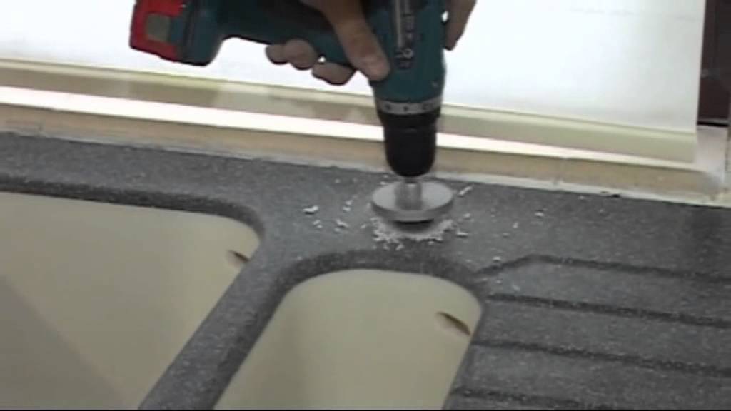 solid surface tap holes - YouTube