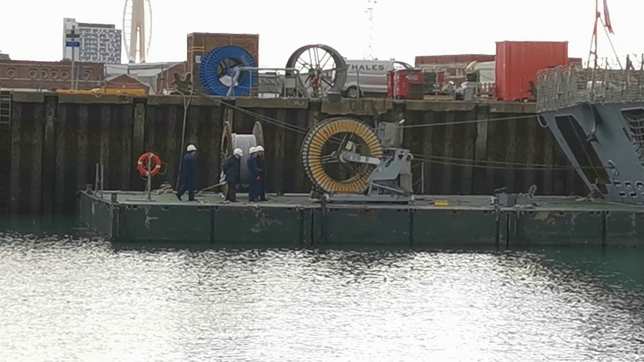Reinstalling the towed array cable on HMS Westminster - YouTube