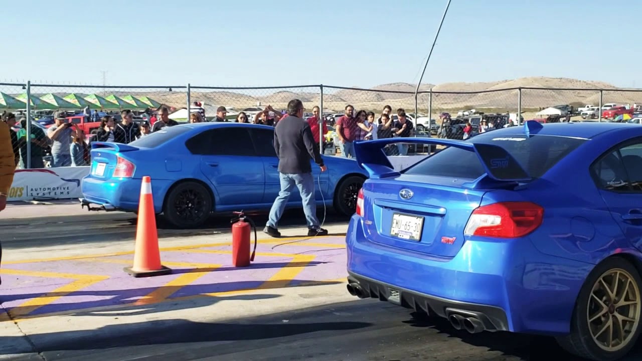 Subaru wrx sti vs Subaru Legacy - YouTube