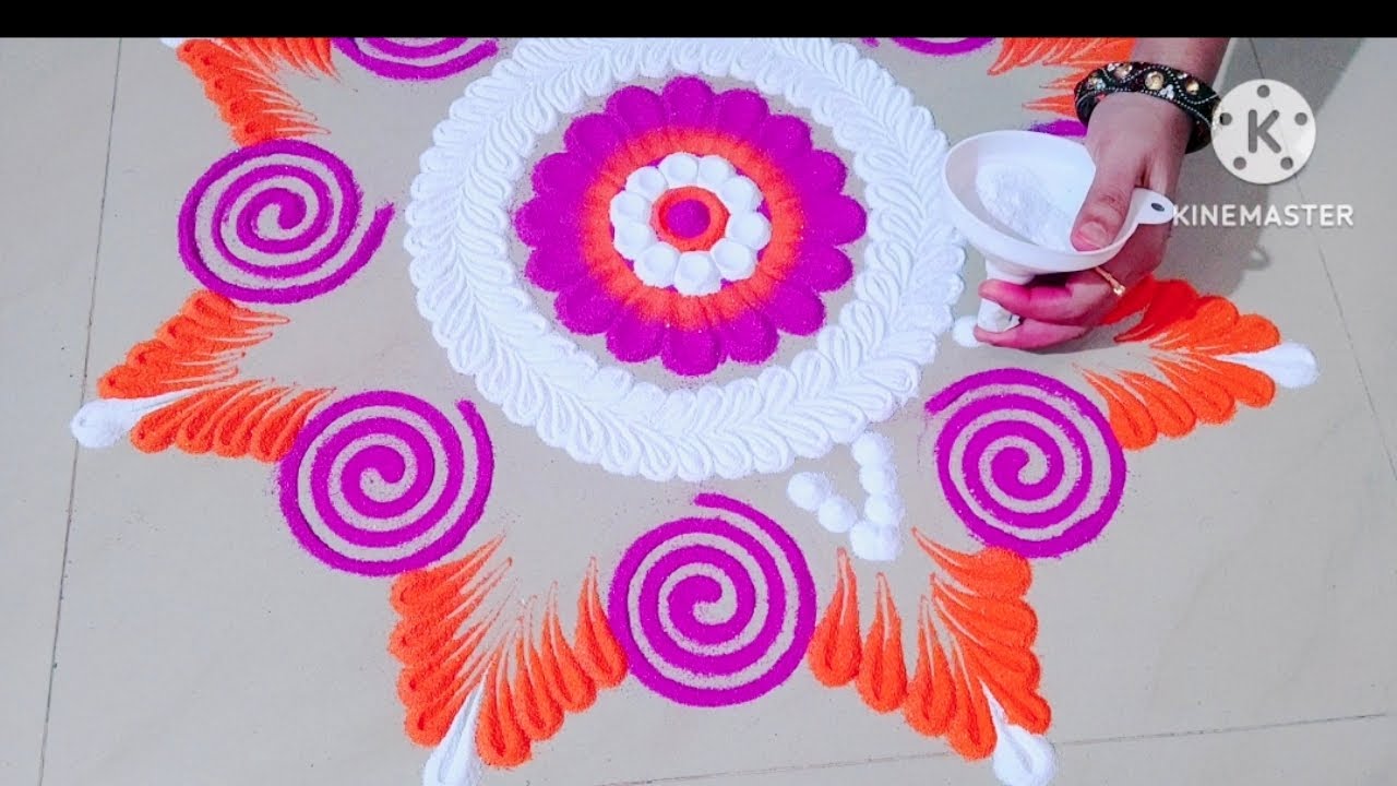 Beautiful creative rangoli design | Orange and pink color combination ...