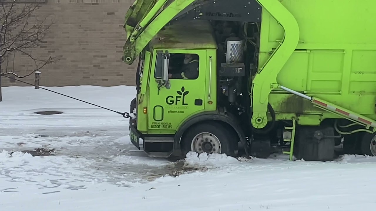 Heavy Duty Wrecker Recovery. Front Waste Hauler Dumpster Truck Stuck in ...