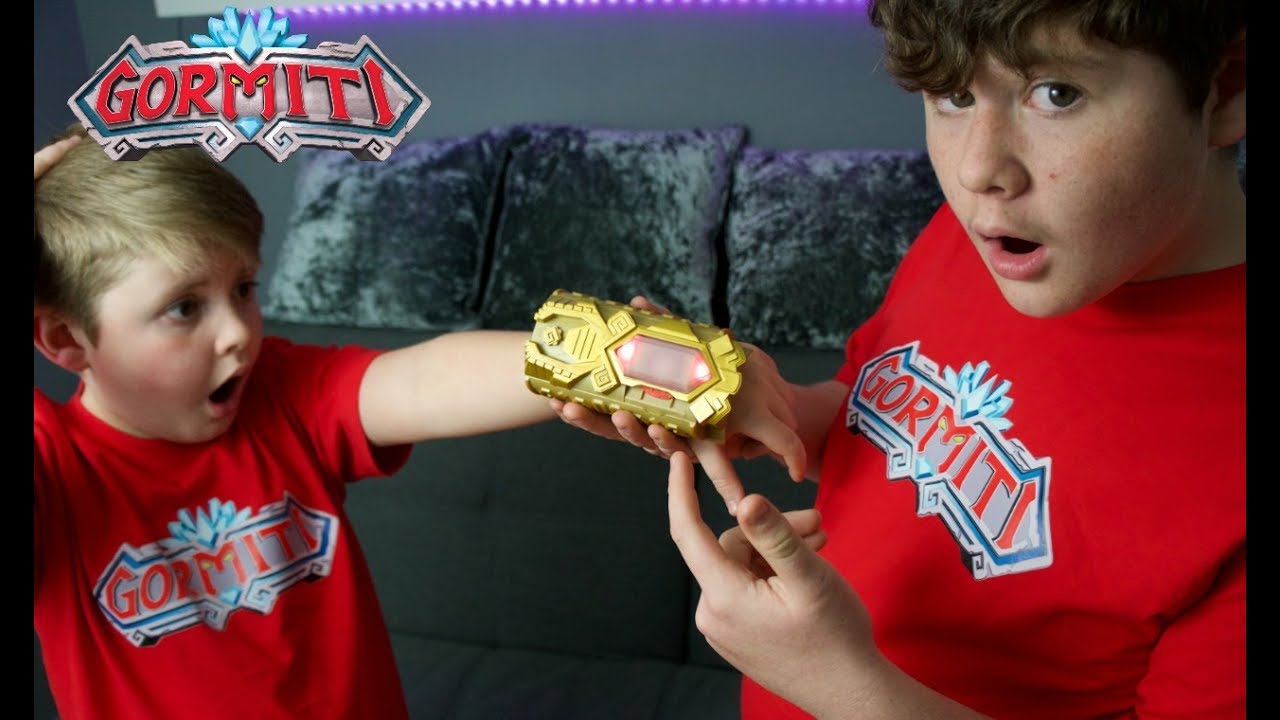 Gormiti Elemental Bracer - Push the tokens into the bracer to hear the ...