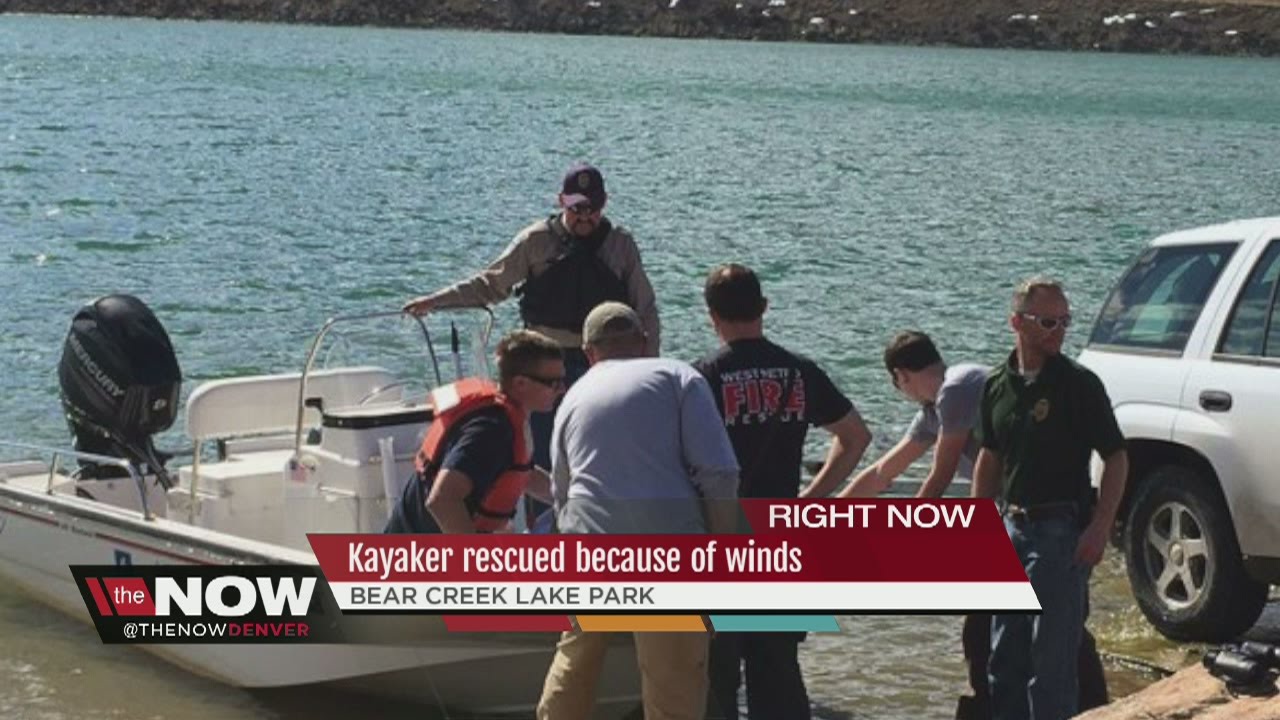 Kayaker rescued, overturned in high winds - YouTube