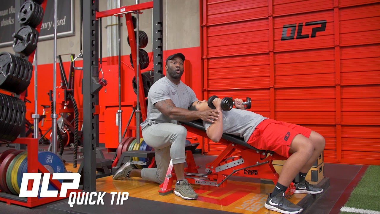 Spotting DB Bench Press - youth football - YouTube