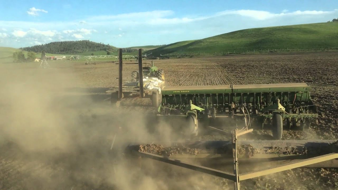 Pasture plowing, disking, and planting late early summer 2014 JD 4640 ...