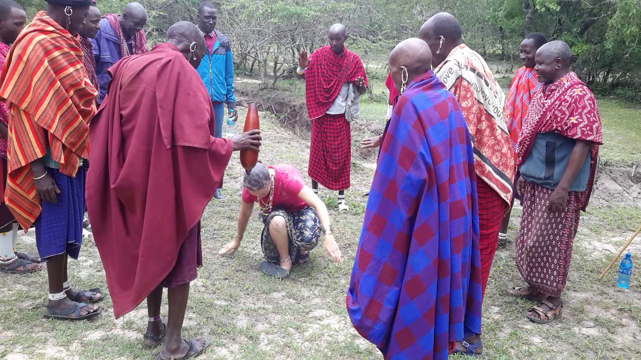 Good luck or when twenty old men spit milk on you - YouTube