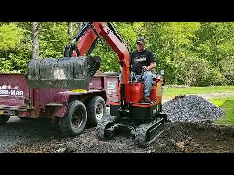 Gardner's Groundhog Mini Excavator using 32inch bucket - YouTube