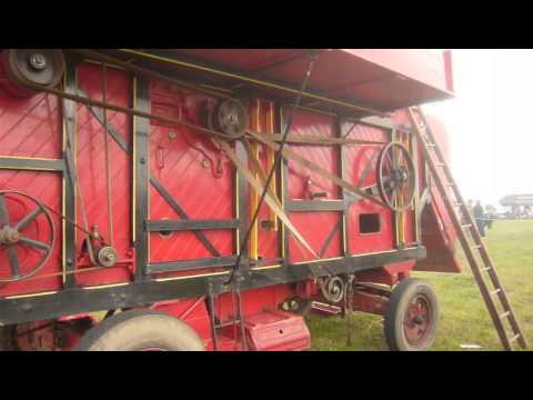 Old belt driven threshing machine, and tractor. - YouTube