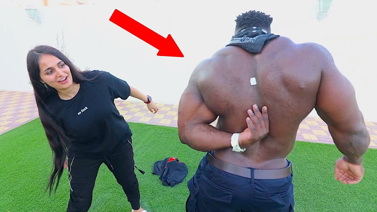 Bodybuilder Can't Reach Sticker on His Back !!! - YouTube