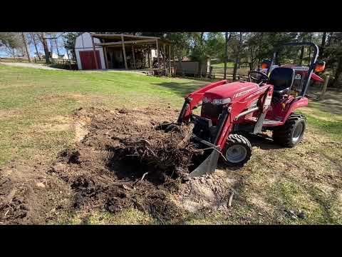 Massey Ferguson GC 1705 subcompact tractor removing a stump - YouTube