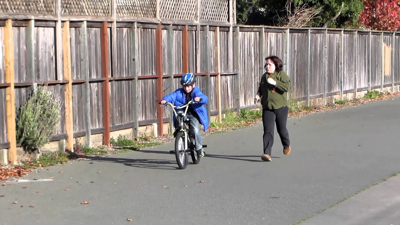 Travis riding his new bike - YouTube