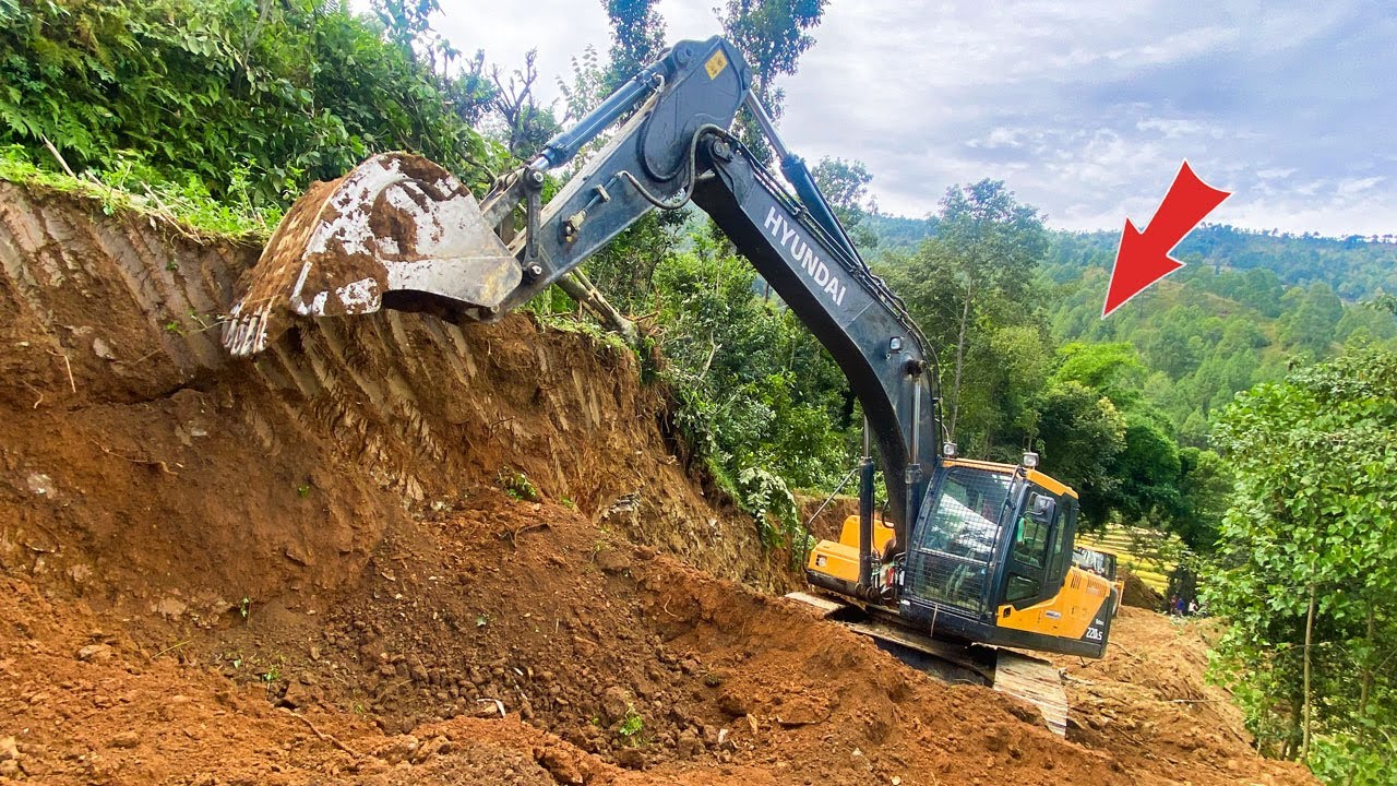 Excavator CARVES Epic Road Through Treacherous Terrain | Excavator ...