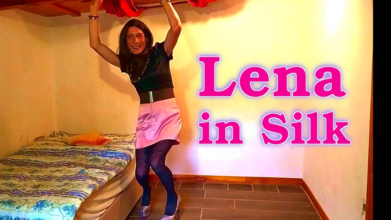 Crossdresser Lena in pink mini skirt and black silk blouse - with high ...