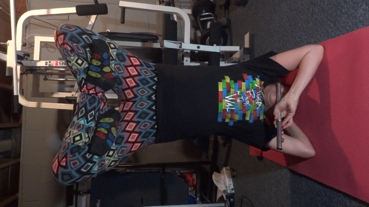 Headstand while playing flute one-handed with legs in the Lotus ...