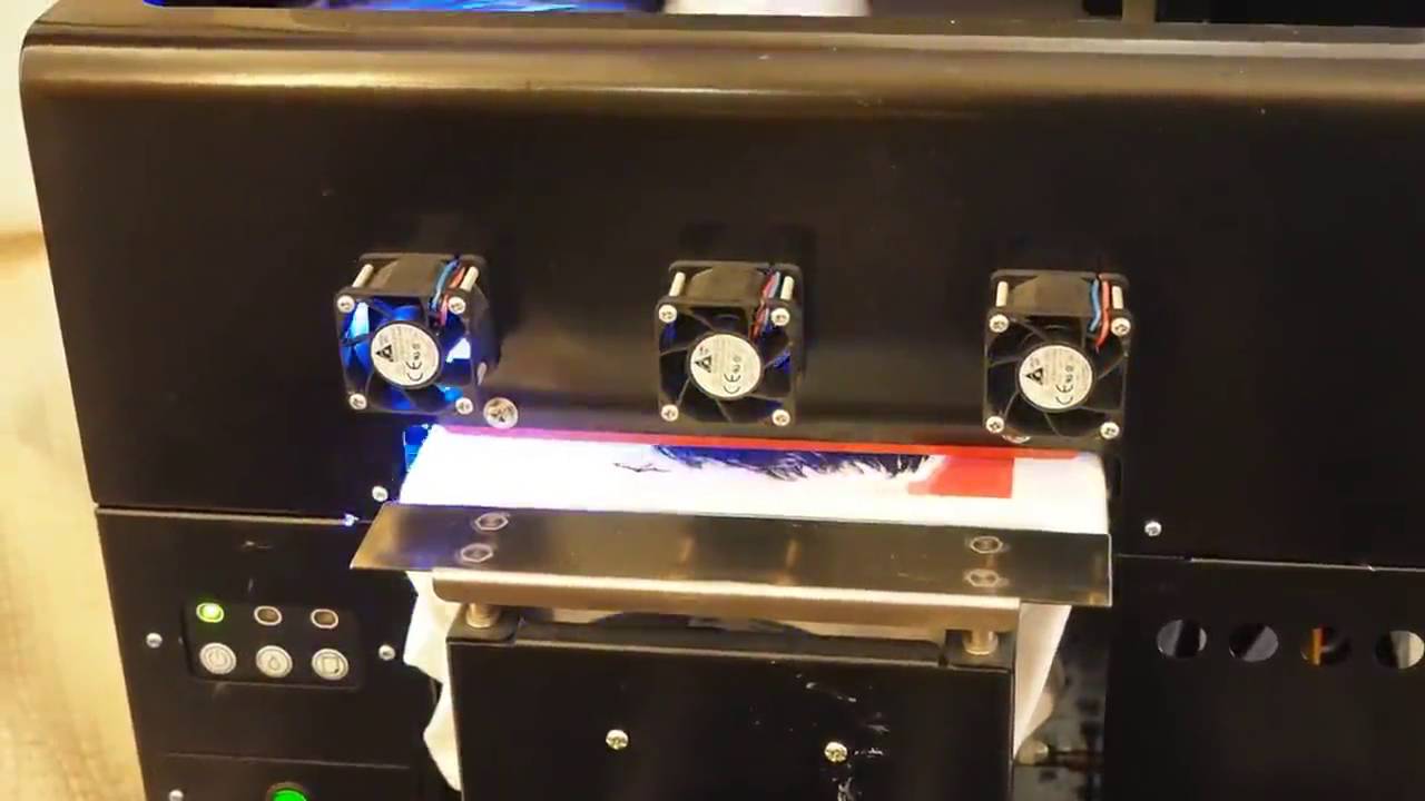 UV printer printing in t shirts using soft ink - YouTube