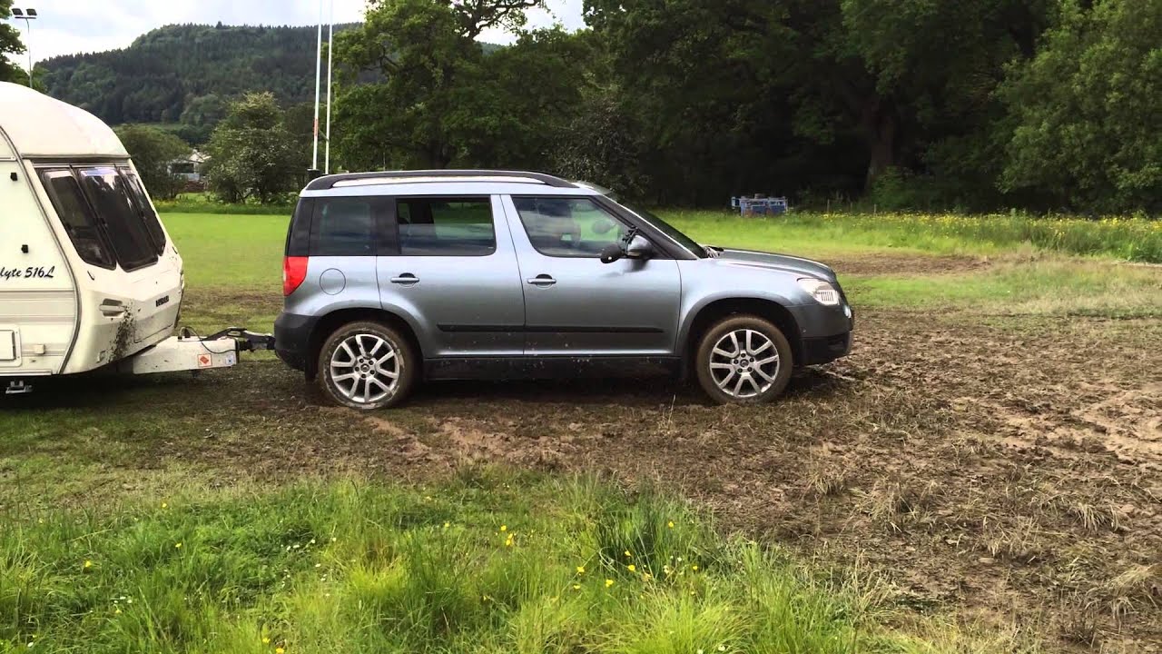 Yeti's AWD makes light work of mud and caravan - YouTube