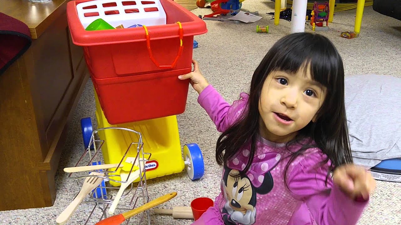 Stina offering to make food in her make believe setting - YouTube