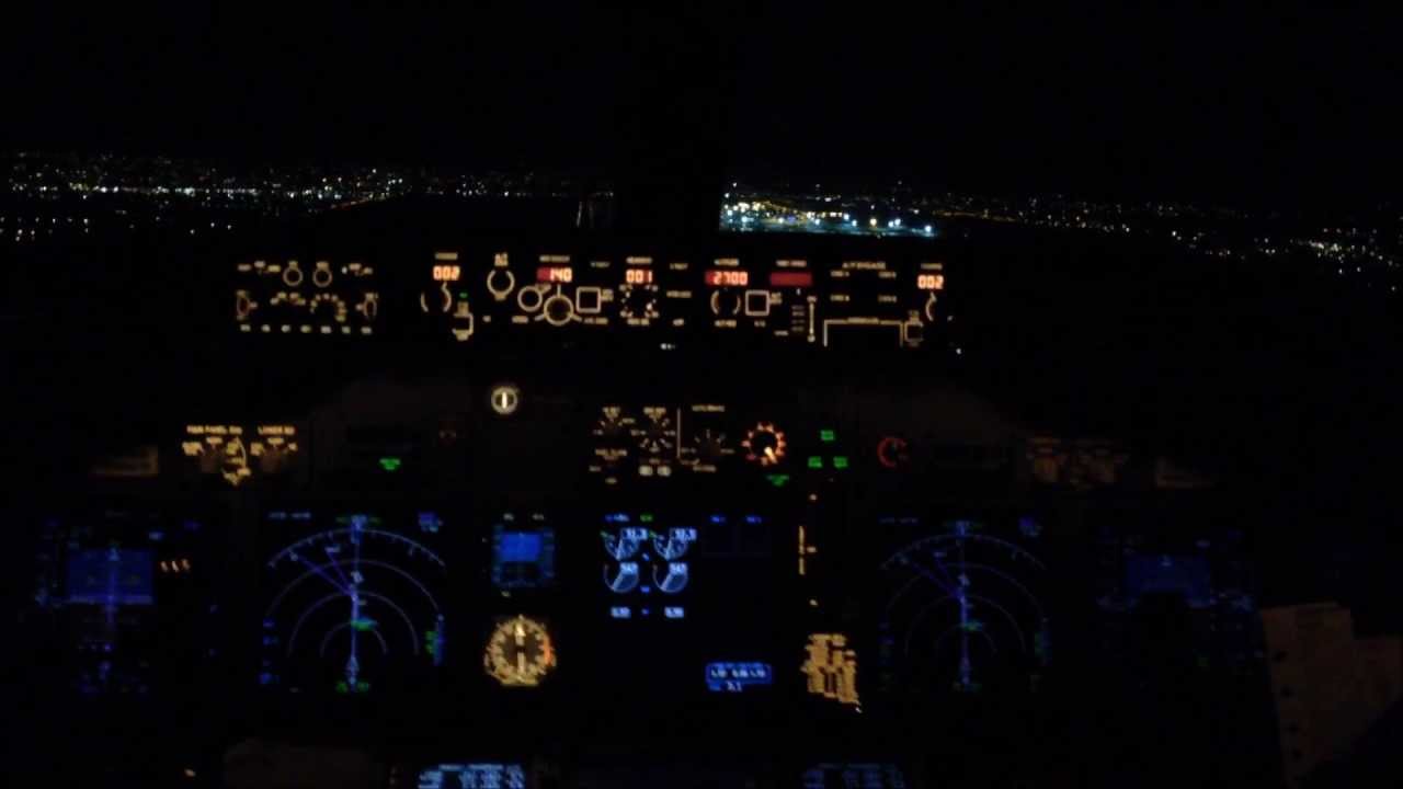 B737 night cockpit landing - YouTube