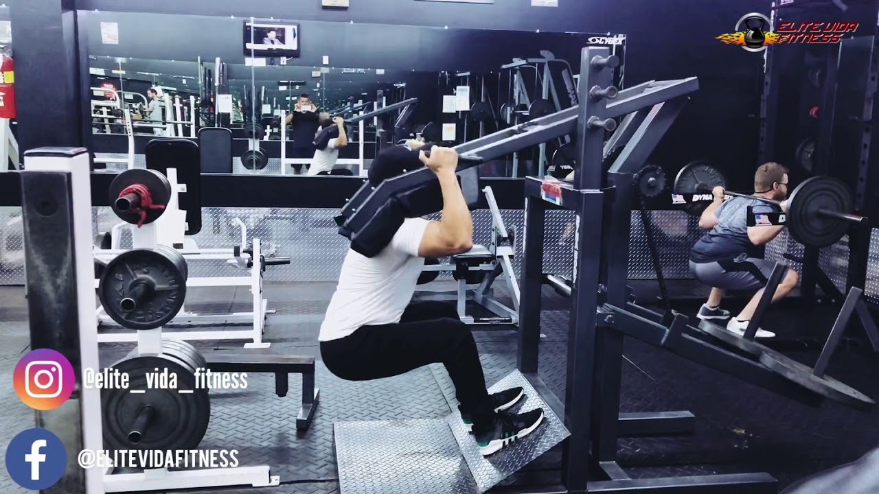 Lever squat machine (narrow stance) - YouTube