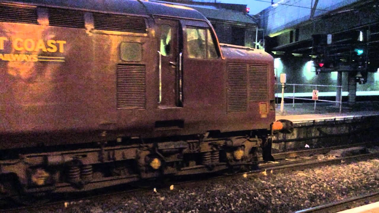 Class 37 number 37706 departing Paddington on 29th Nov 2014 following ...